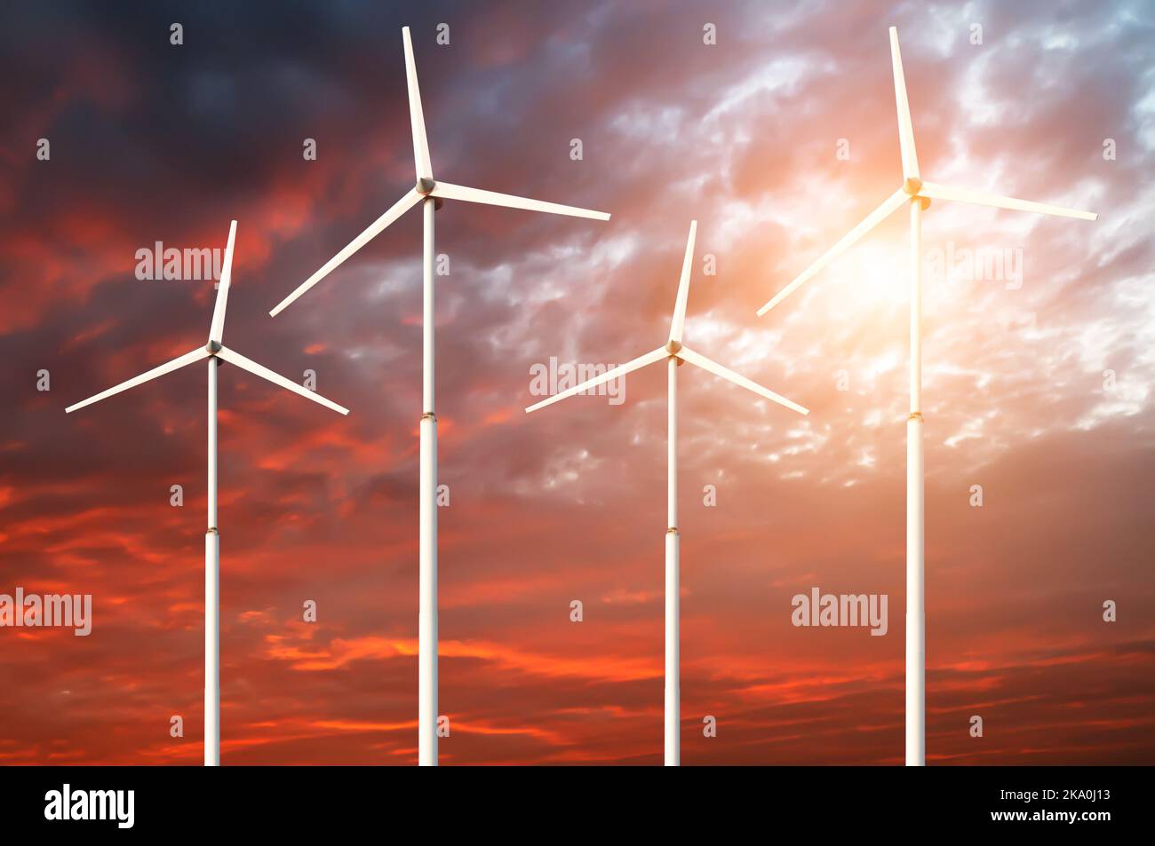 Green renewable energy concept - wind generator turbines in sky Stock ...