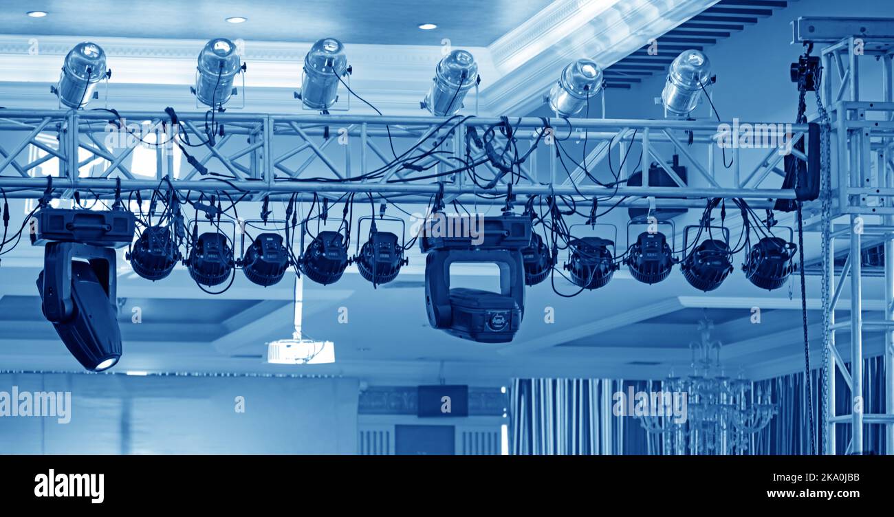 Studio lighting equipment high above an outdoor theatrical performance ...