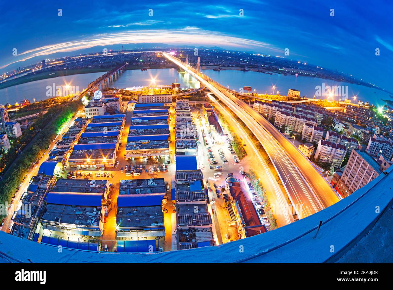 Fisheye Lens view of City skyline at night Stock Photo - Alamy