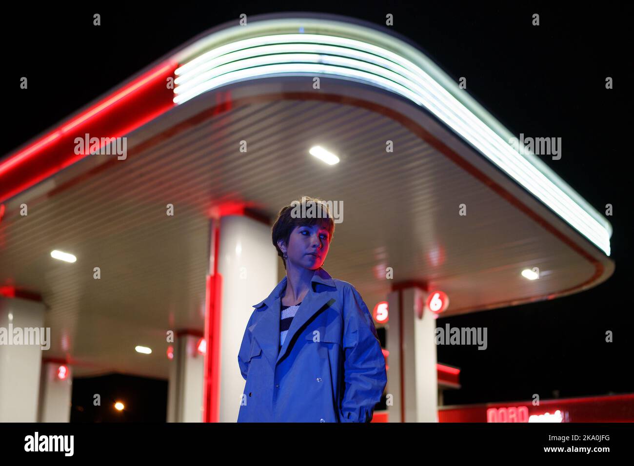 Gas station night woman hi-res stock photography and images - Alamy