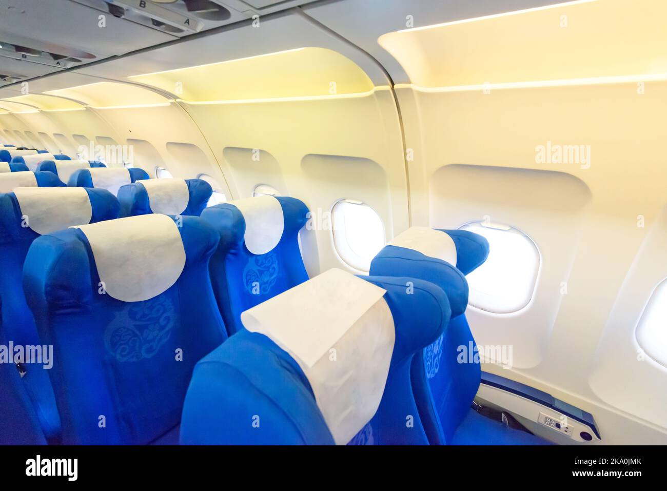 Empty aircraft seats and windows Stock Photo - Alamy