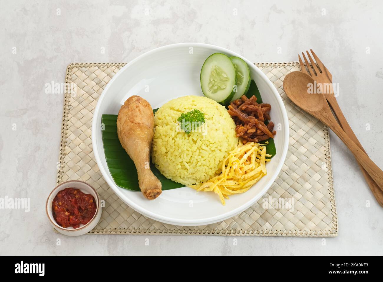 Nasi kuning, Indonesian traditional food, made from rice cooked with ...