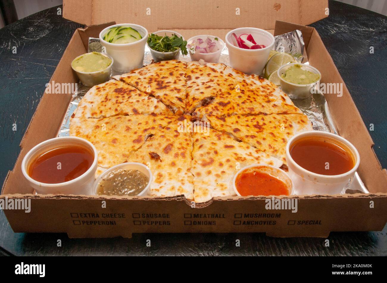 Delicious Mexican cuisine known as birria pizza pie Stock Photo - Alamy