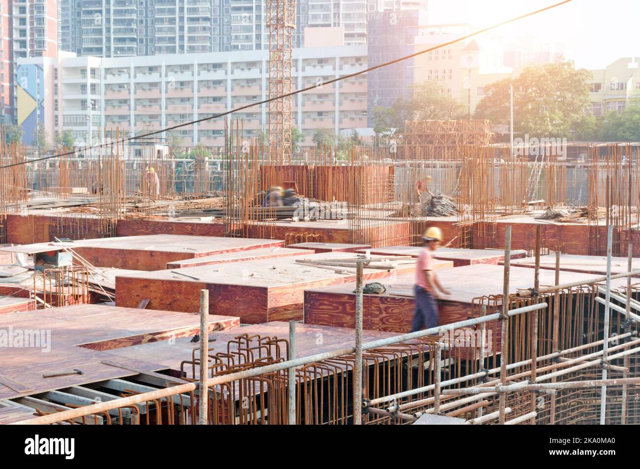building under construction with workers Stock Photo - Alamy