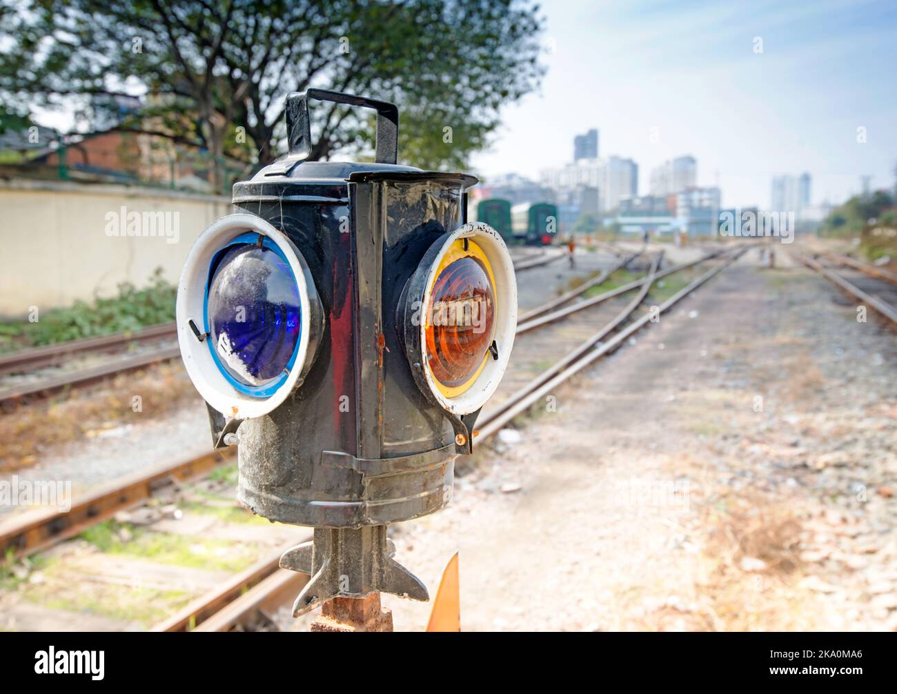 Traffic light shows blue signal on railway Stock Photo - Alamy