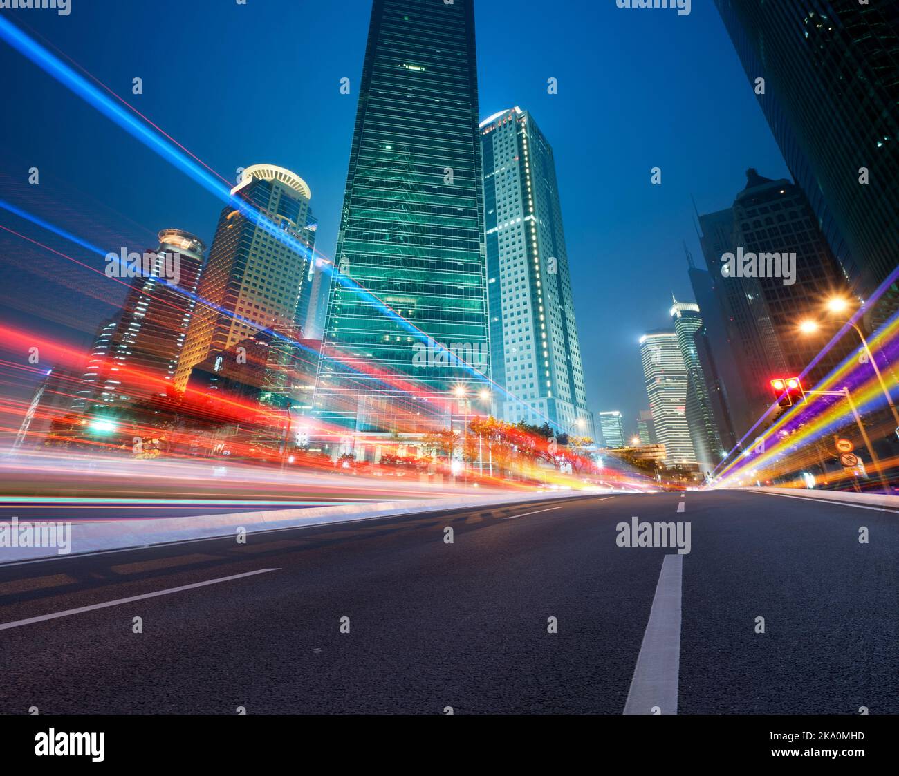 Asphalt road and modern city Stock Photo - Alamy