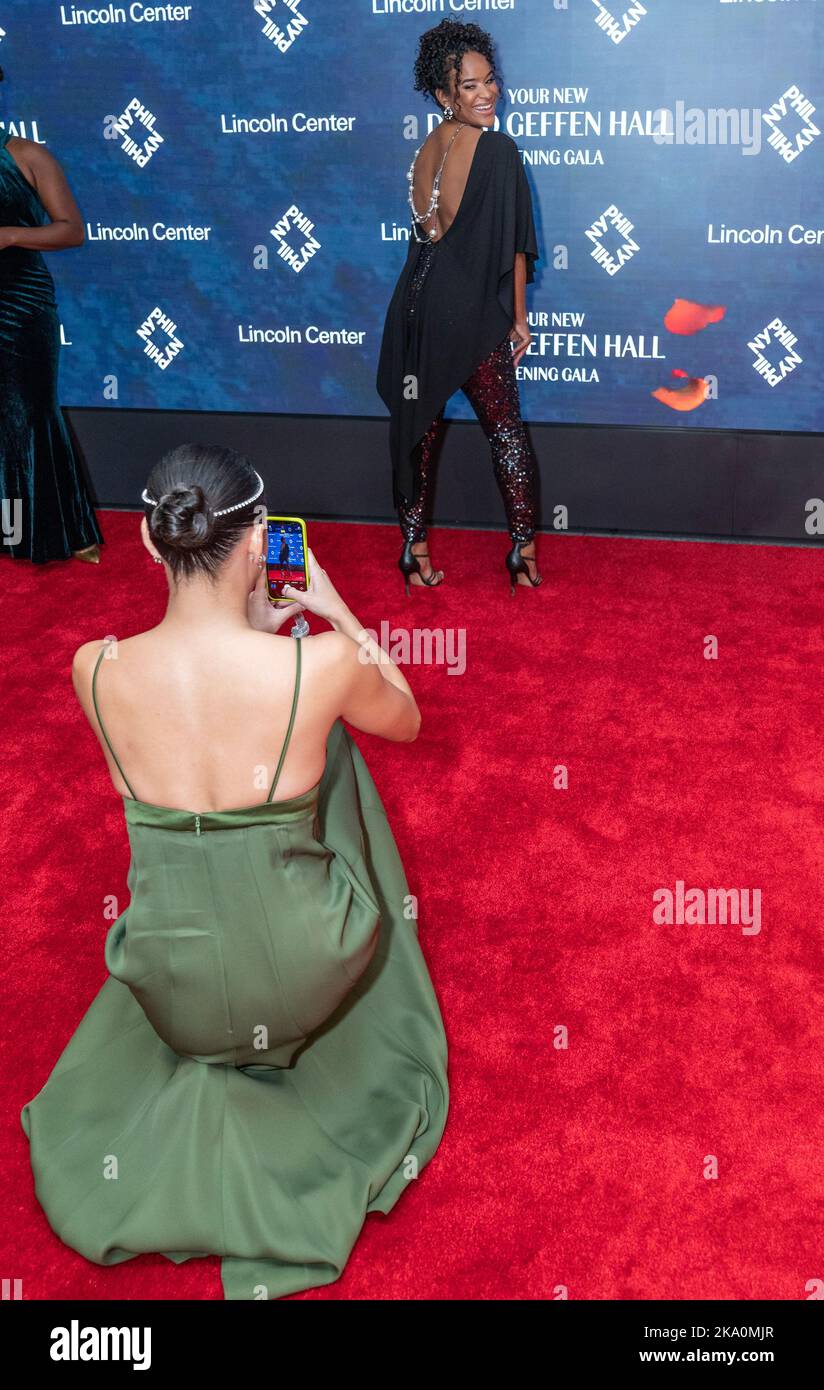 Sabrina Imamura takes photo of Darilyn Castillo while attending New ...