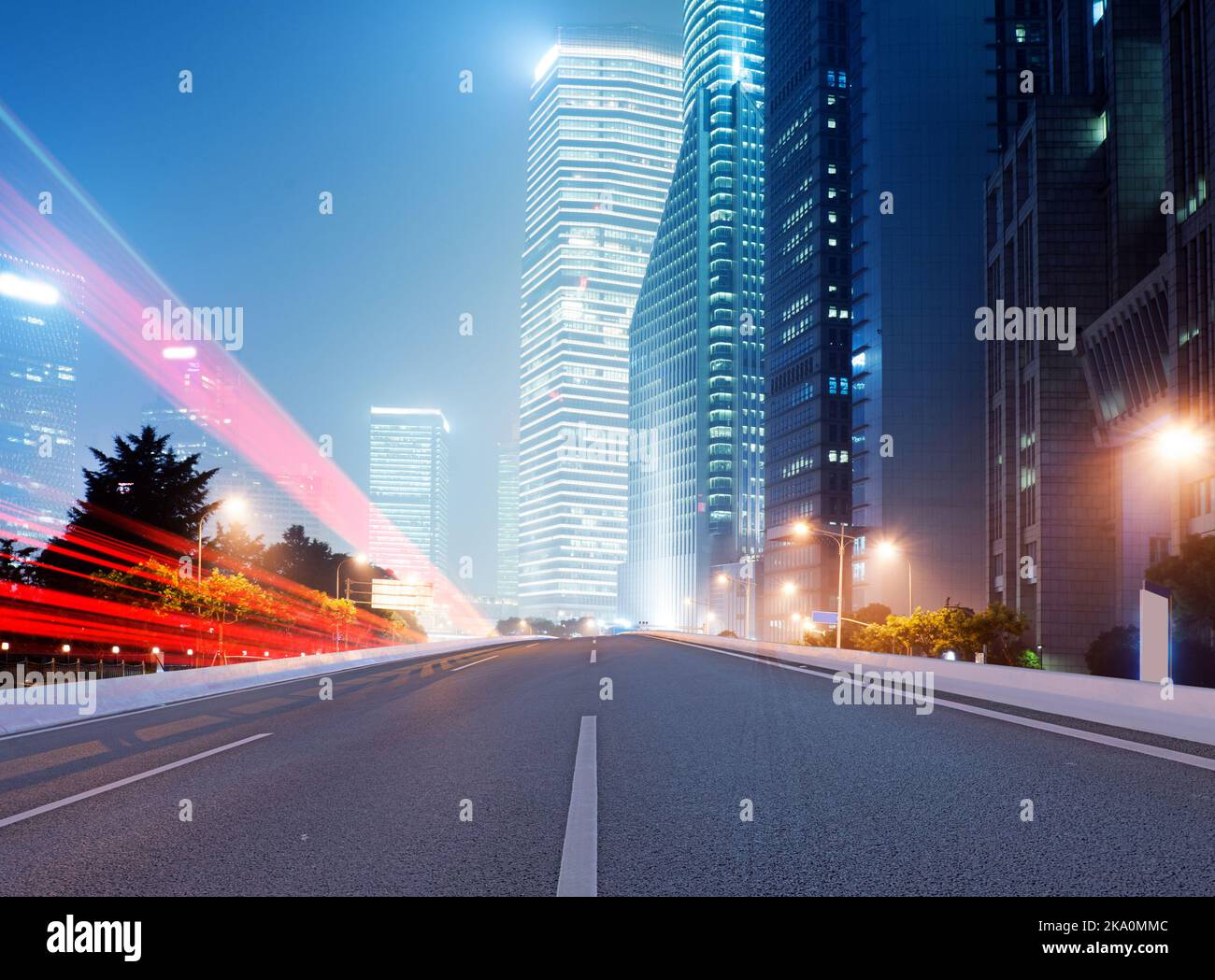 Asphalt road and modern city Stock Photo - Alamy