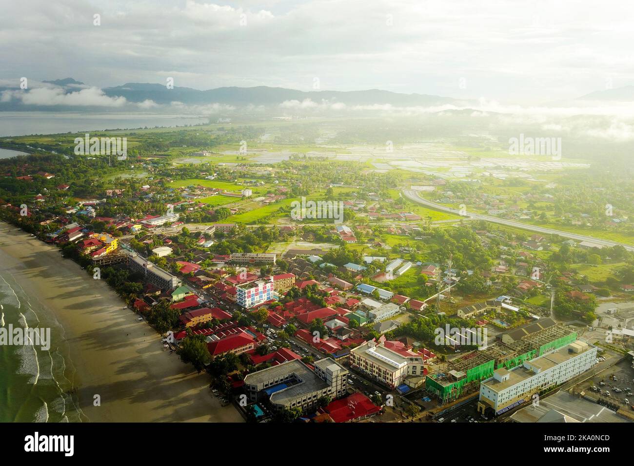 Aerial view of Chenang Beach, Langkawi and village surrounding after ...