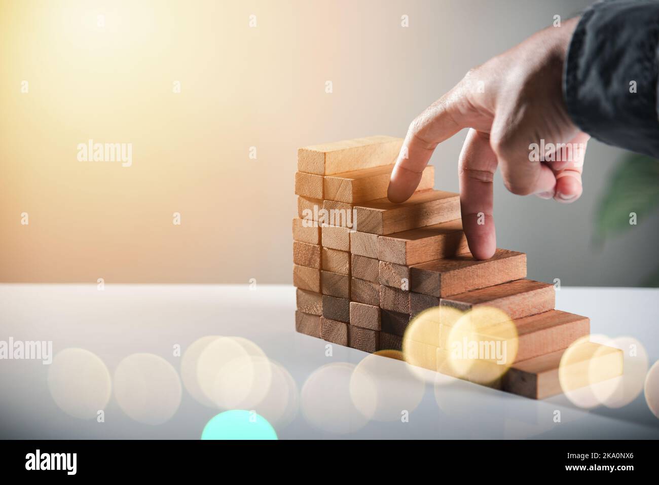 Business two finger symbol walking up on wood blocks shape staircase to ...