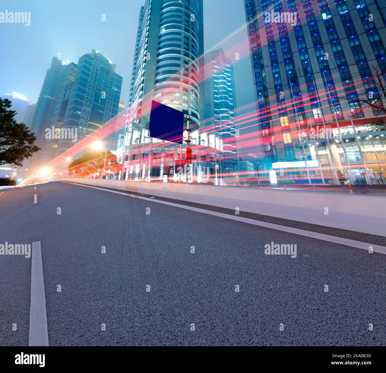 Asphalt road and modern city Stock Photo - Alamy