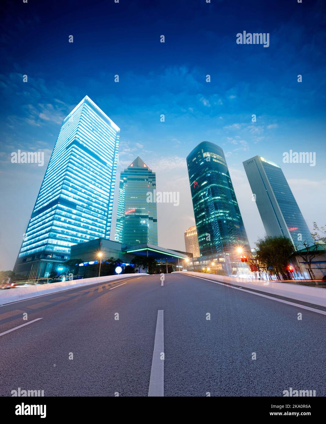 Asphalt road and modern city Stock Photo - Alamy