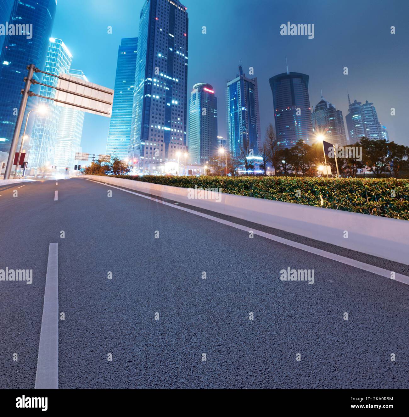 Asphalt road and modern city Stock Photo - Alamy