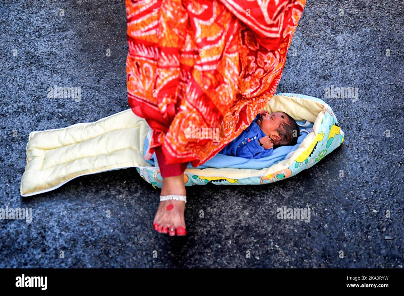 A Hindu devotee performs Dandi Ritual dedicated to Lord Sun during the ...