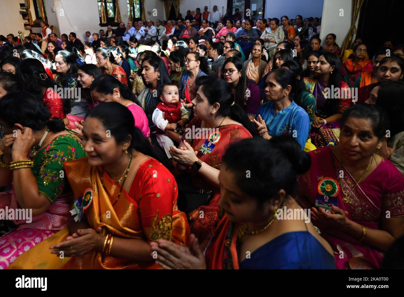 Women are seen singing and clapping during a Diwali Celebration. Diwali ...