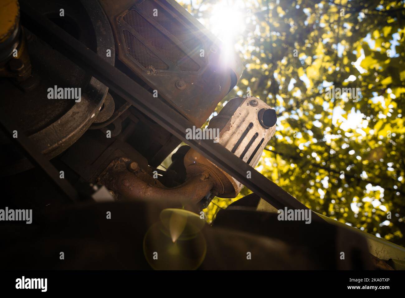 Diesel engine of a walk-behind tractor with a belt drive close-up ...