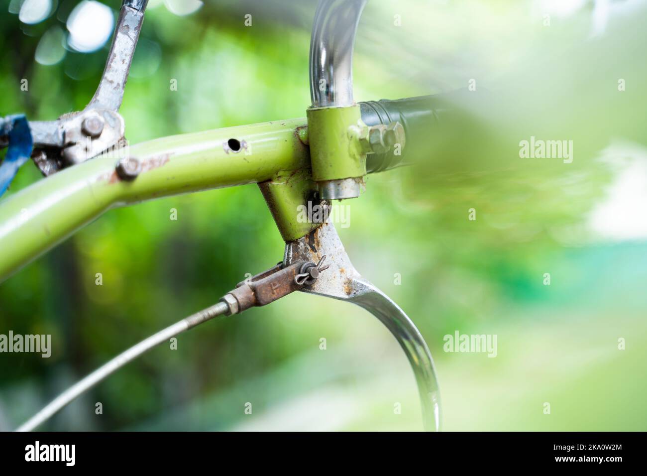 Handle for blocking the wheel and turning on a walk-behind tractor ...