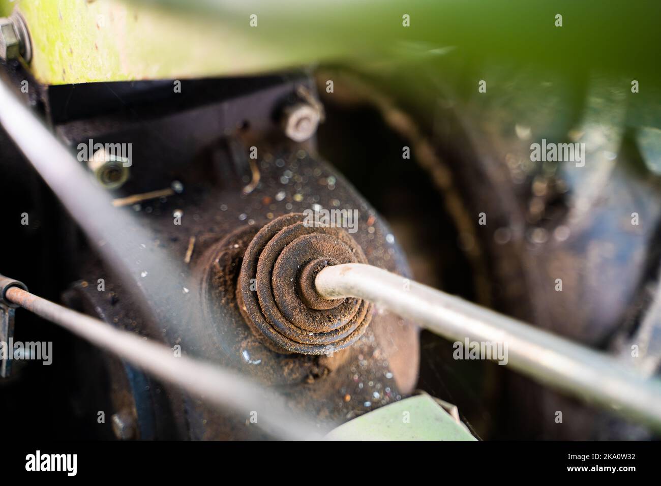 Gear lever on a walk-behind tractor close-up on a blurred background ...