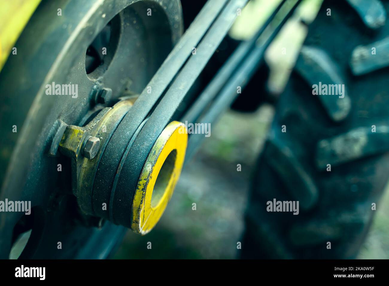 Walk-behind tractor pulley with two belts close-up. Tractor for ...