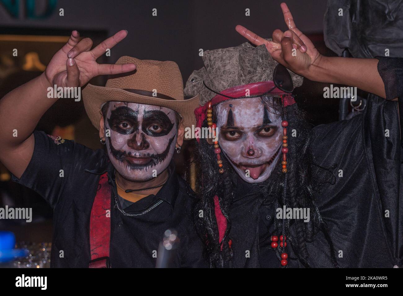 Halloween celebration, bartenders in costumes at The Hard Rock Cafe ...