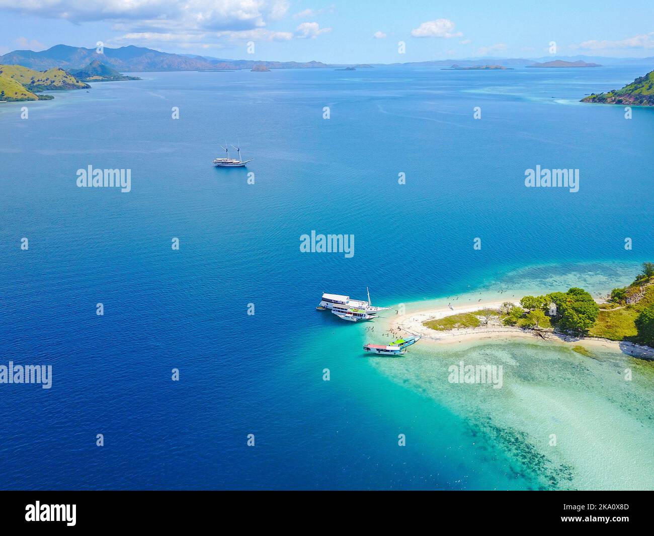 Beautiful aerial view of beaches and tourist boat sailing in Flores ...