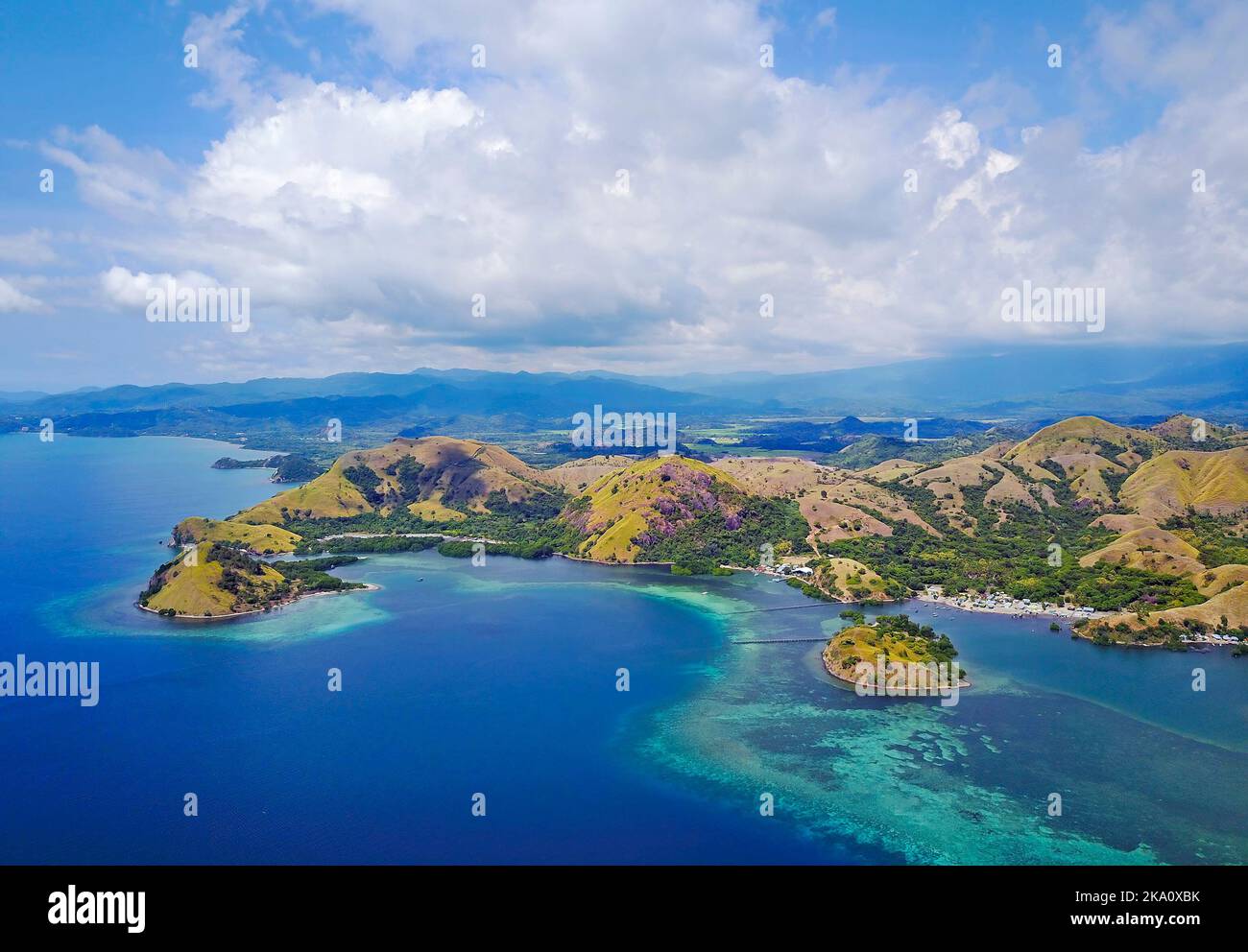 Beautiful aerial view of beaches and tourist boat sailing in Flores ...