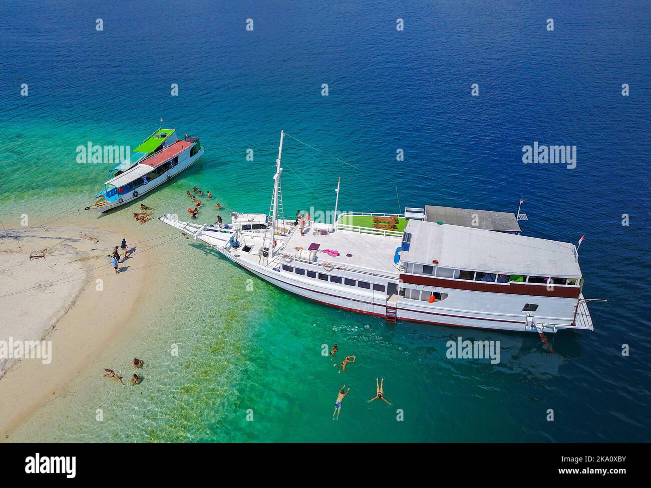 Beautiful aerial view of beaches and tourist boat sailing in Flores ...