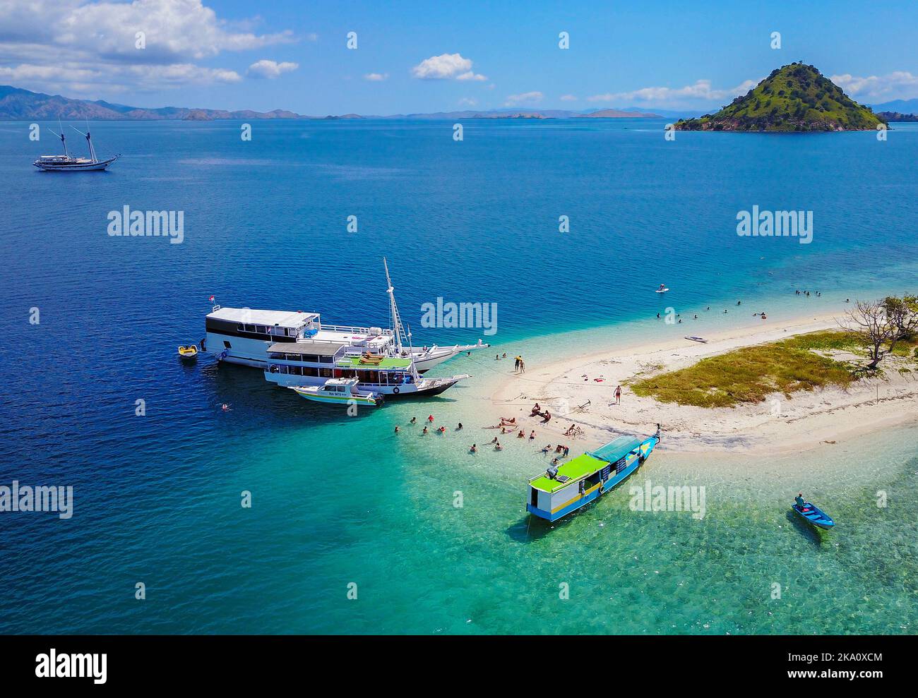 Beautiful aerial view of beaches and tourist boat sailing in Flores ...