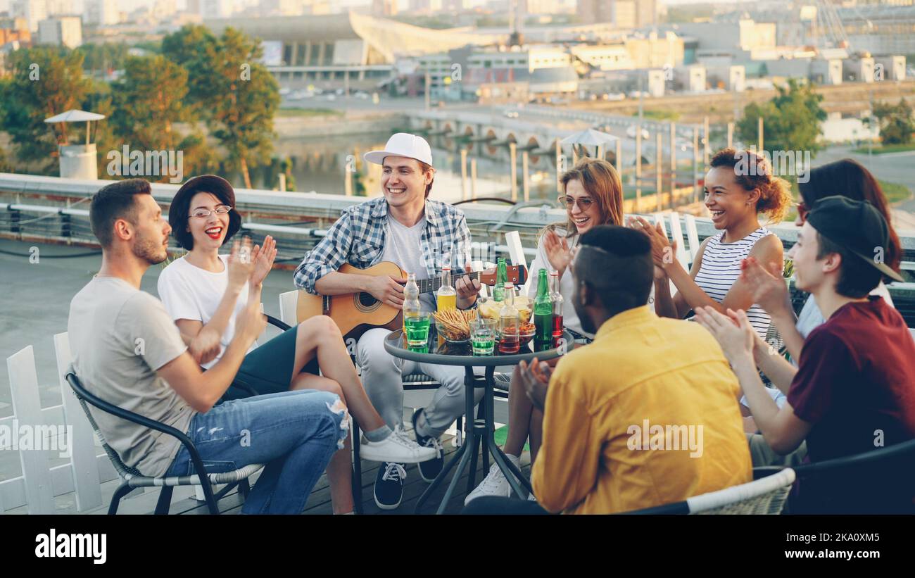 Women dancing playing musical instruments hi-res stock photography and ...