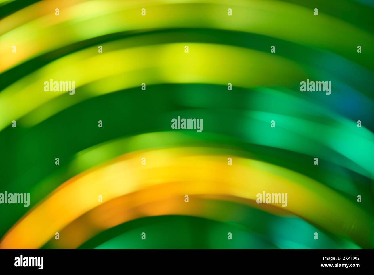 Abstract vibrant green and yellow blur background, dynamic flowing ...