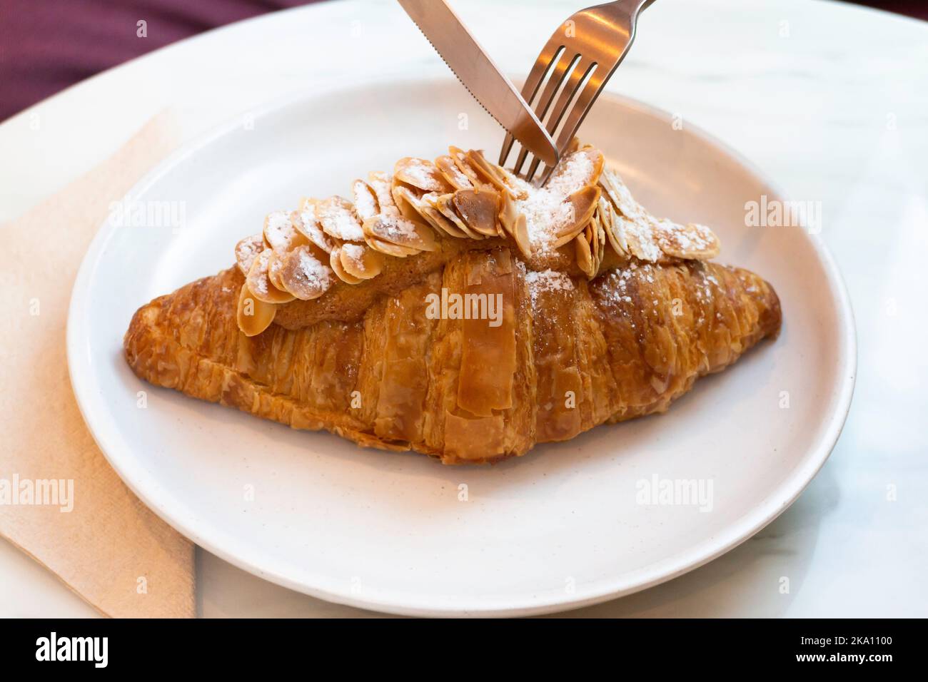 Almond croissant fresh bake serving, stock photo Stock Photo - Alamy