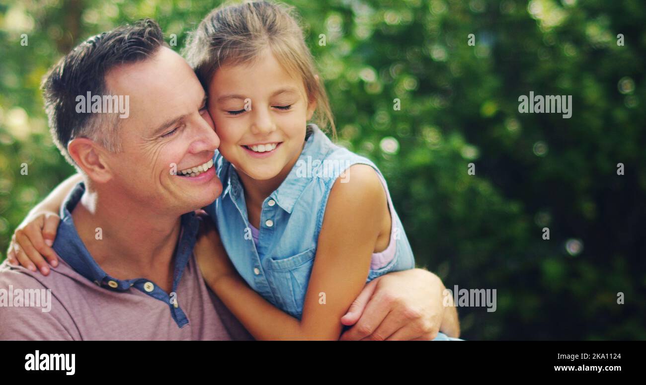 Great fathers raise great daughters. an affectionate little girl ...