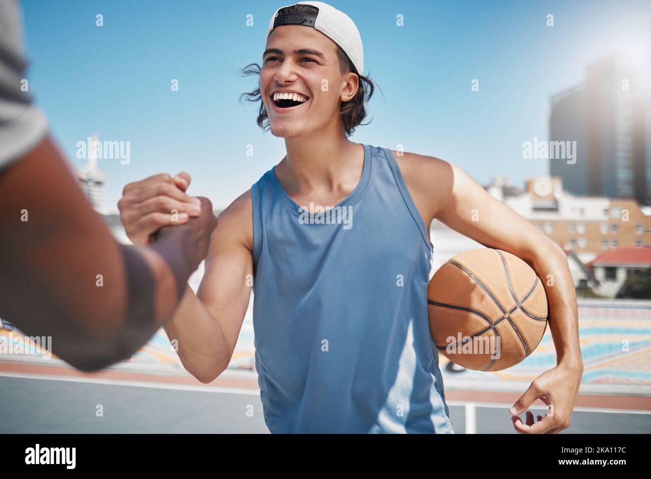 Sports, friends and handshake by man for basketball training at ...