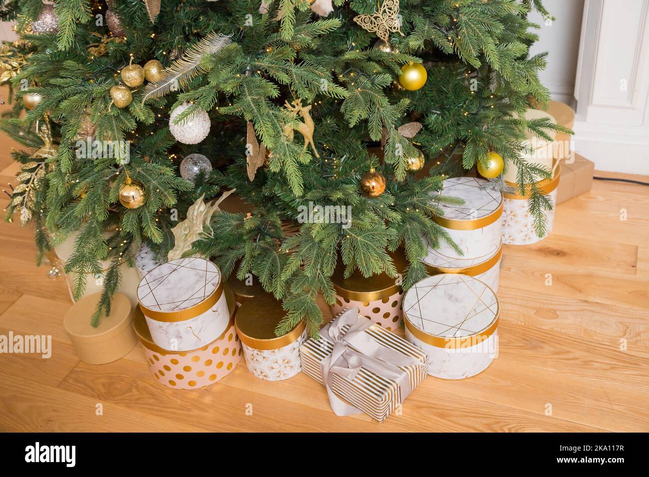 luxury gift boxes under Christmas tree, New Year home decorations ...