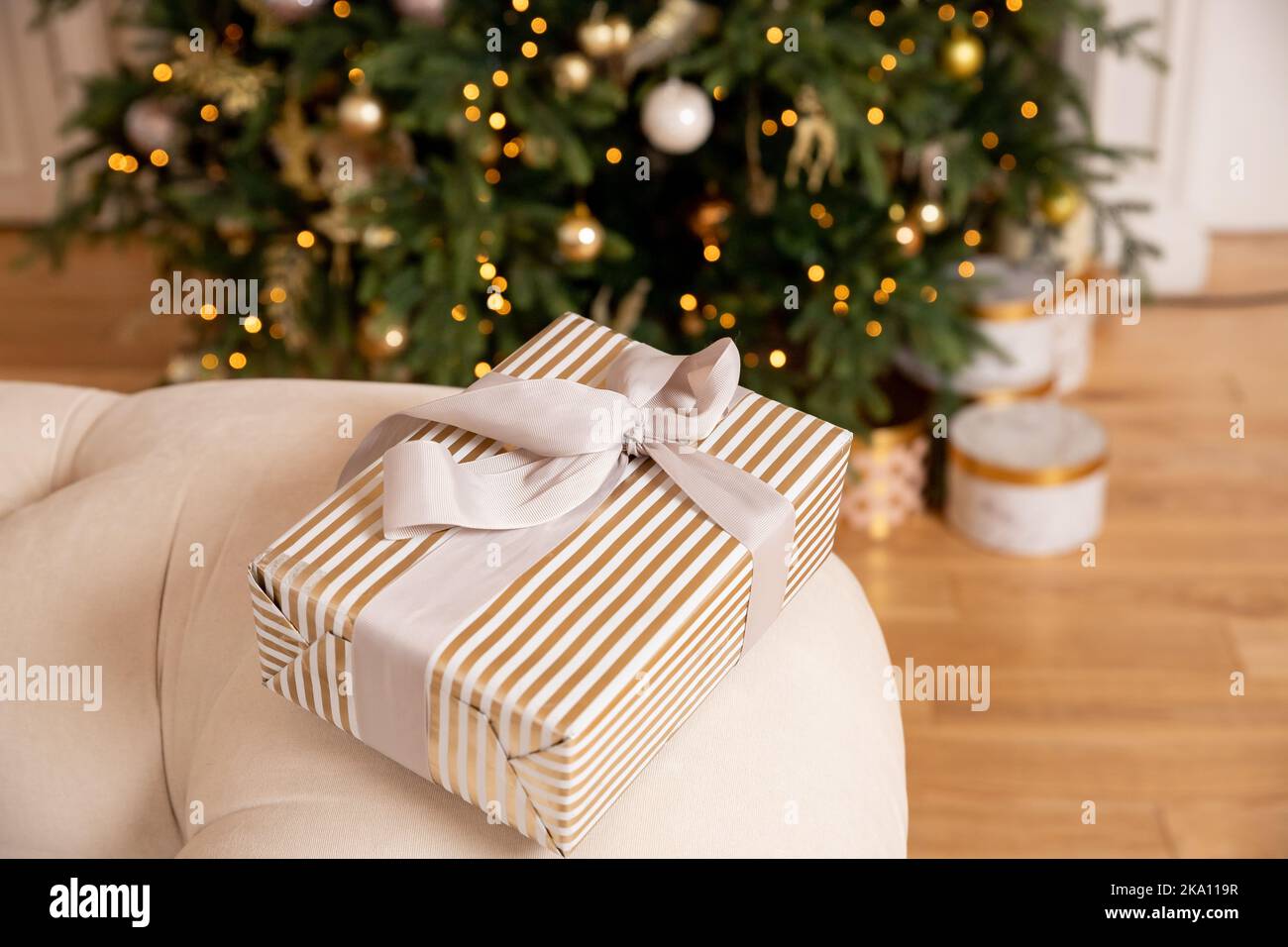 luxury gift boxes under Christmas tree, New Year home decorations ...