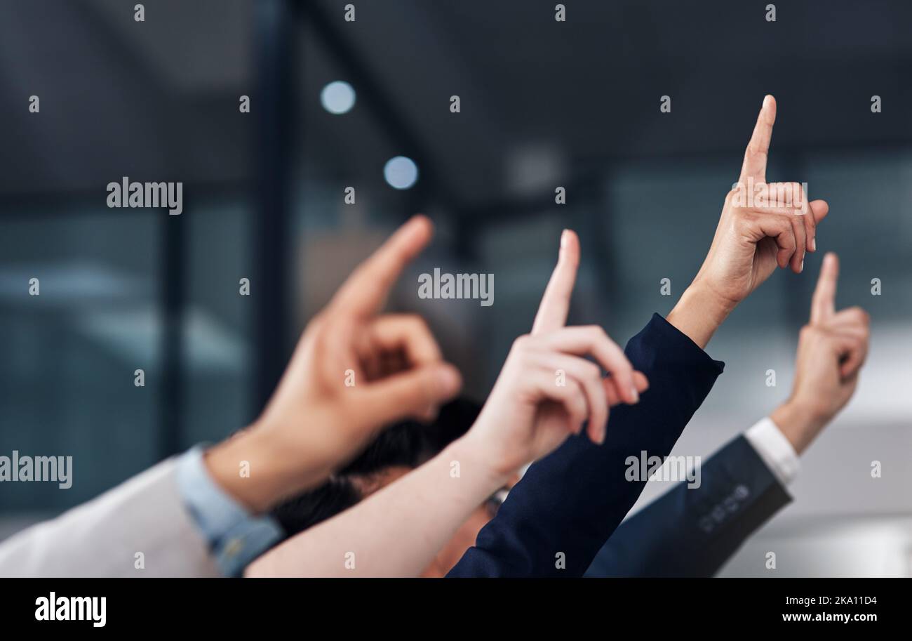 May we interject. a group of businesspeople raising their hands Stock ...