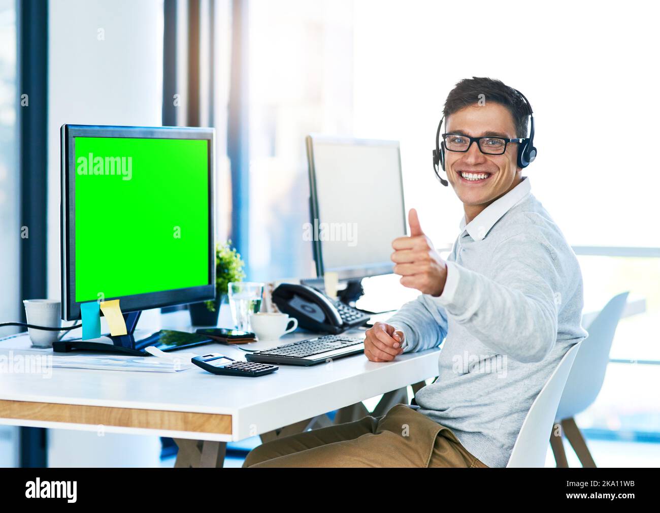 Call center office thumbs hi-res stock photography and images - Alamy