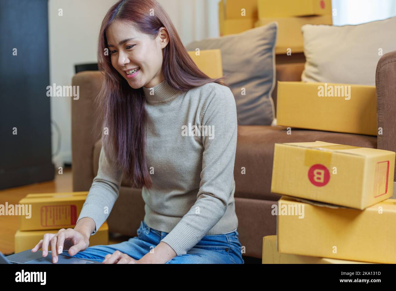 A portrait of a small startup, an SME owner, an Asian female ...