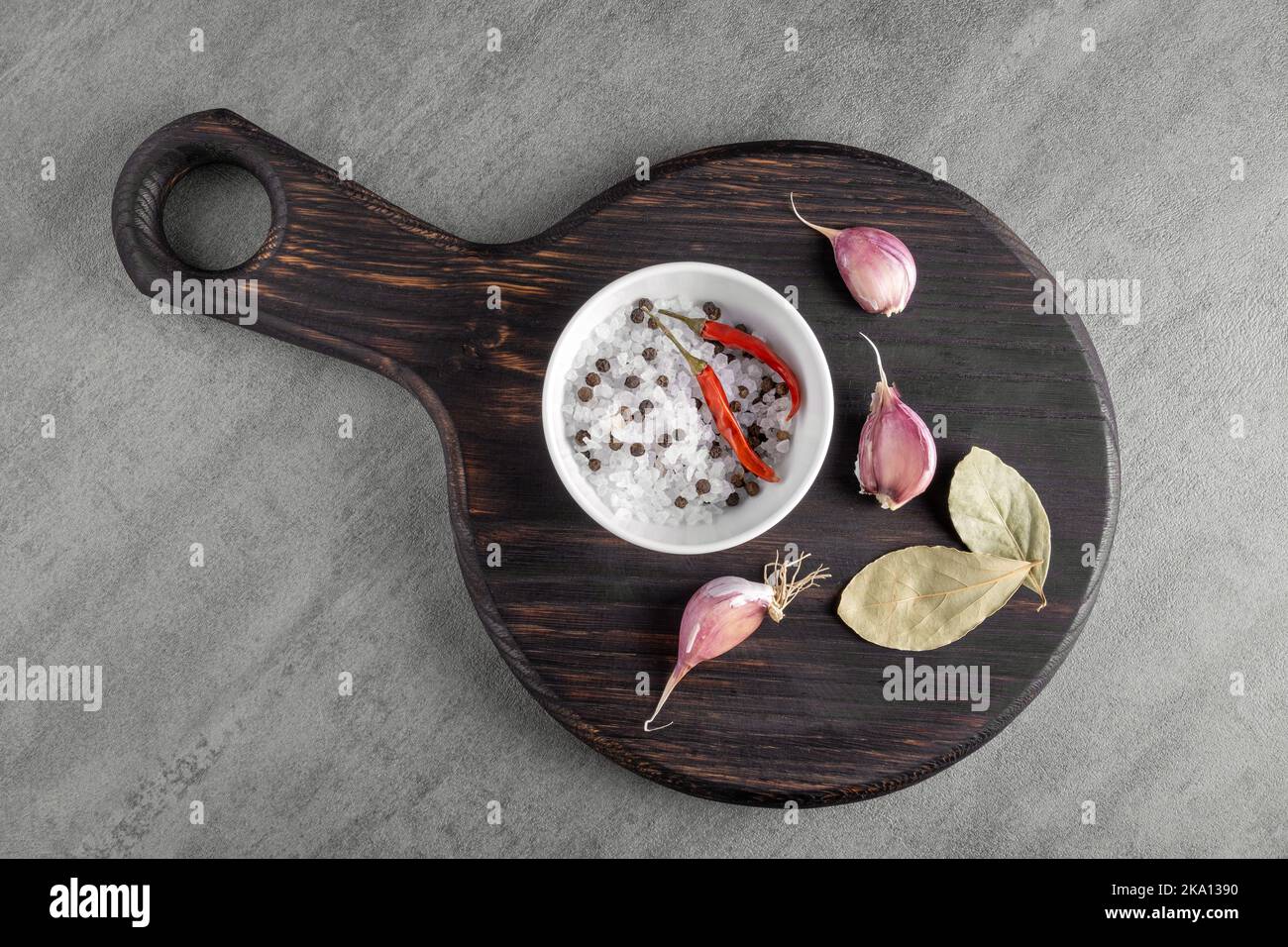 Cutting board or steak board with salt shaker and spices Stock Photo ...