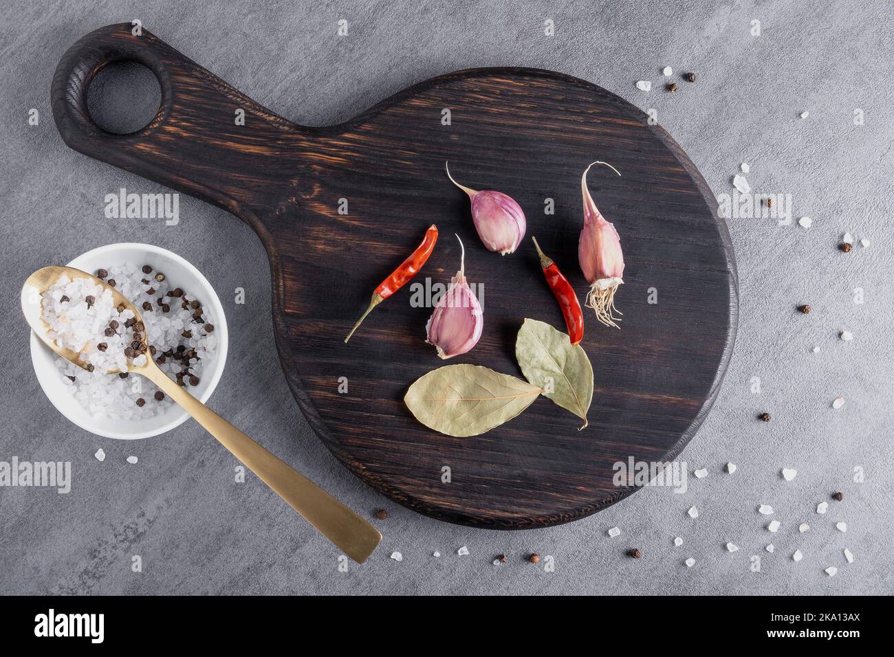 Cutting board or steak board with salt shaker and spices Stock Photo ...