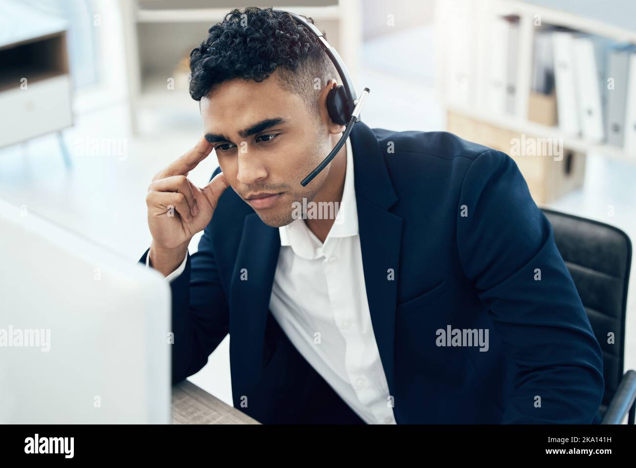 Thinking, stress and call center with businessman at desk for ...
