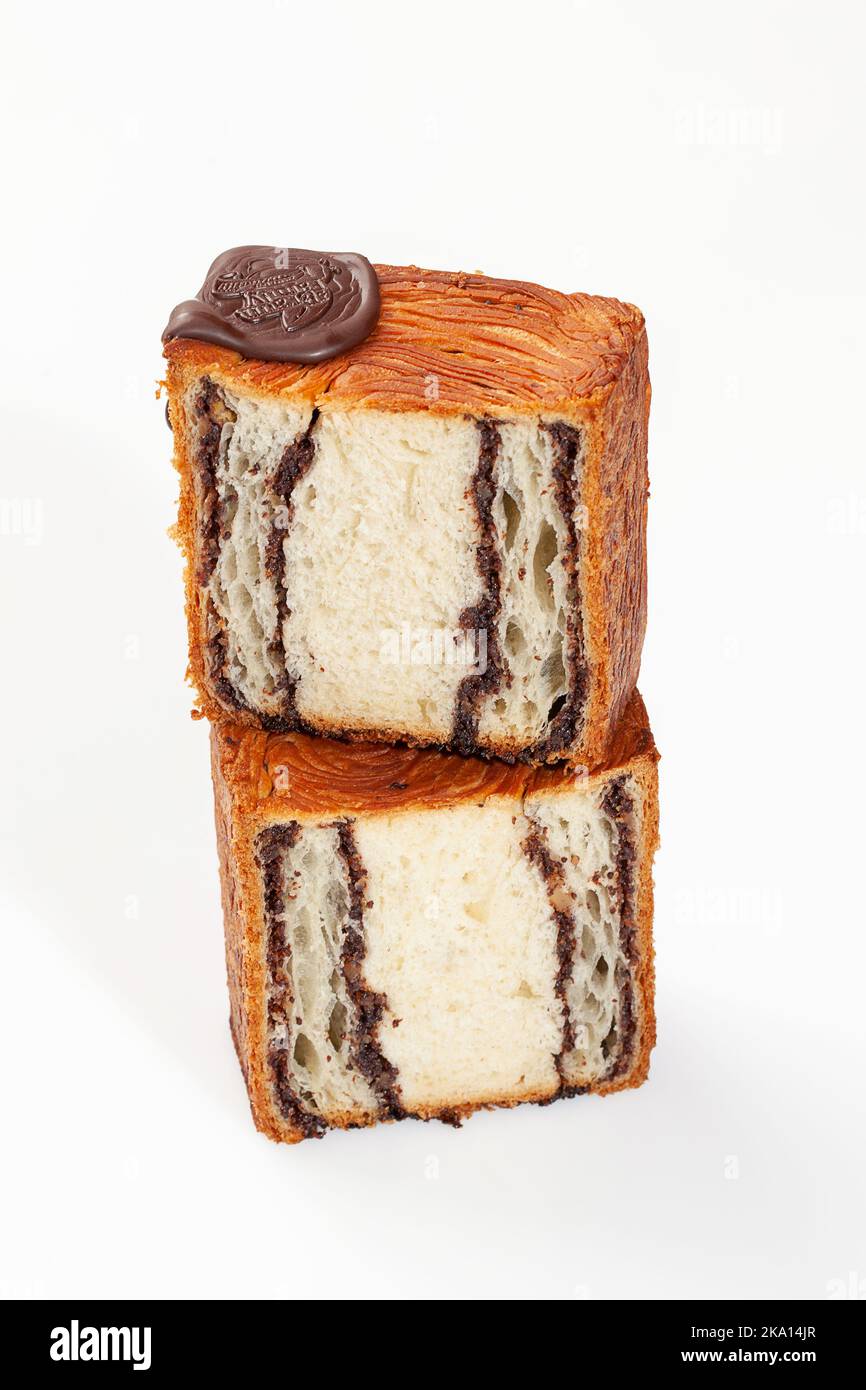 Sliced fluffy cube shaped croissant with marzipan chocolate filling and ...