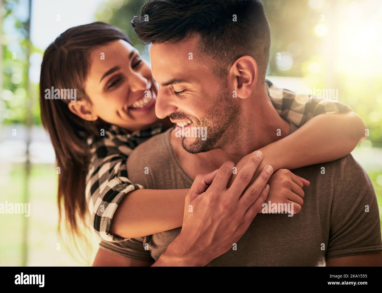 Im forever yours babe. an affectionate young couple bonding at home ...