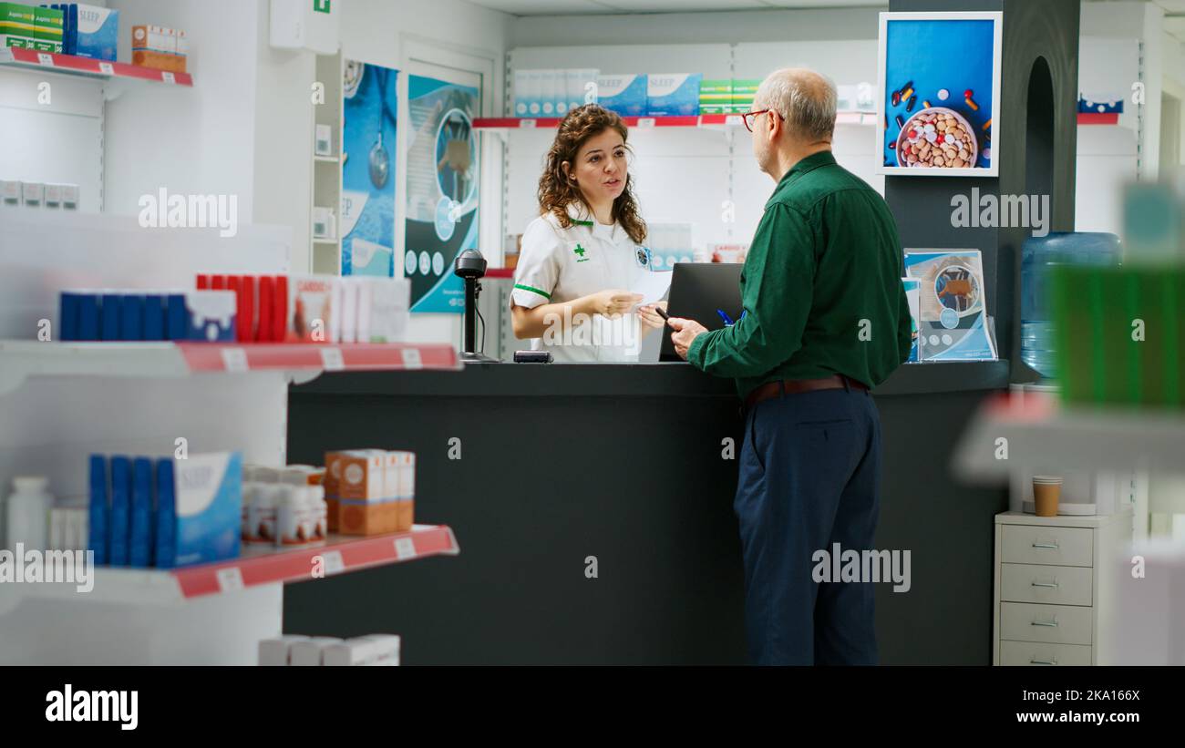 Asking pharmacist for cure hi-res stock photography and images - Alamy