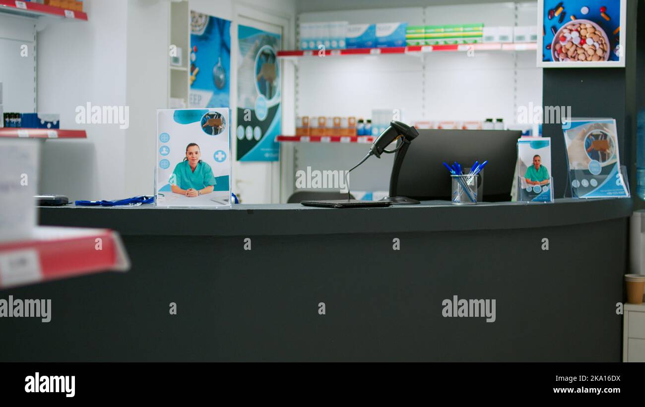 Drugstore desk and shelves having boxes of pills and medication ...