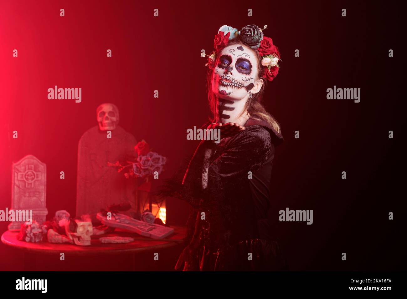 Spooky lady of dead blowing kisses in studio, acting flirty and ...