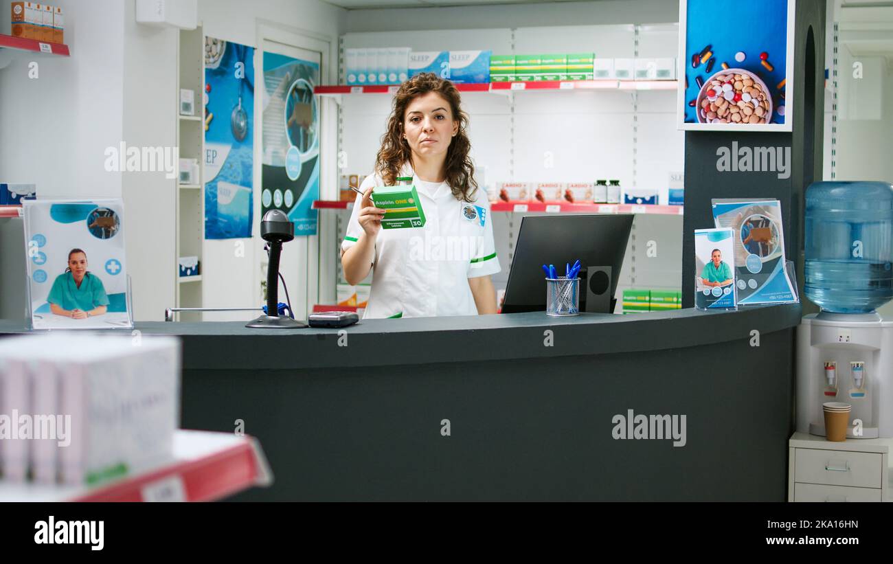 Happy medical employee checking boxes hi-res stock photography and ...