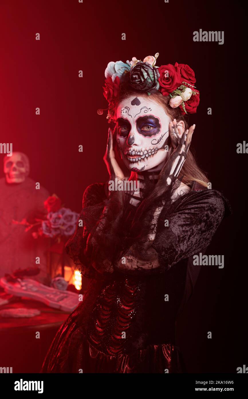 Creepy beautiful model doing flirty kissy face on camera, wearing ...