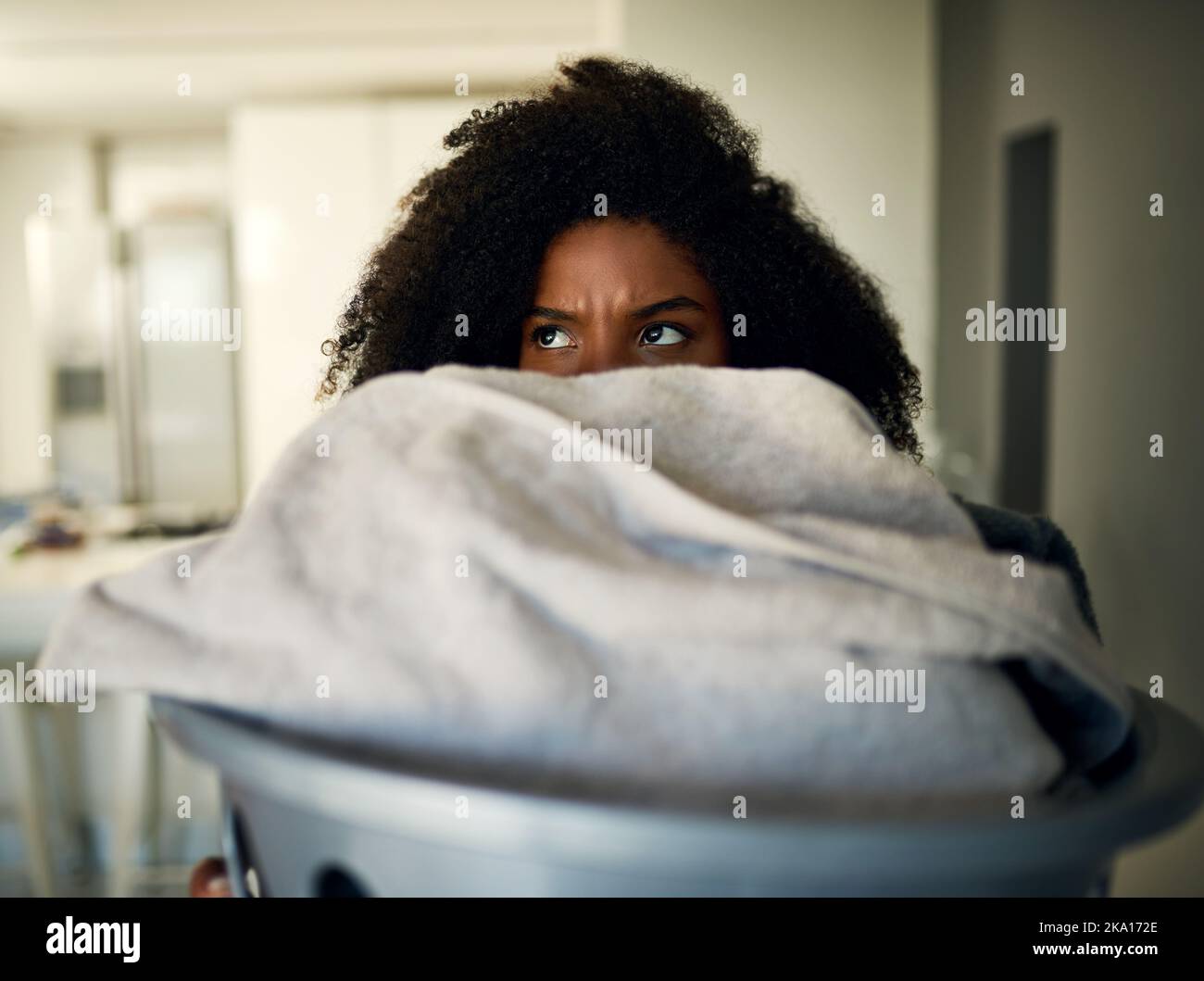 Someone has to do the chores. an attractive young woman doing the ...