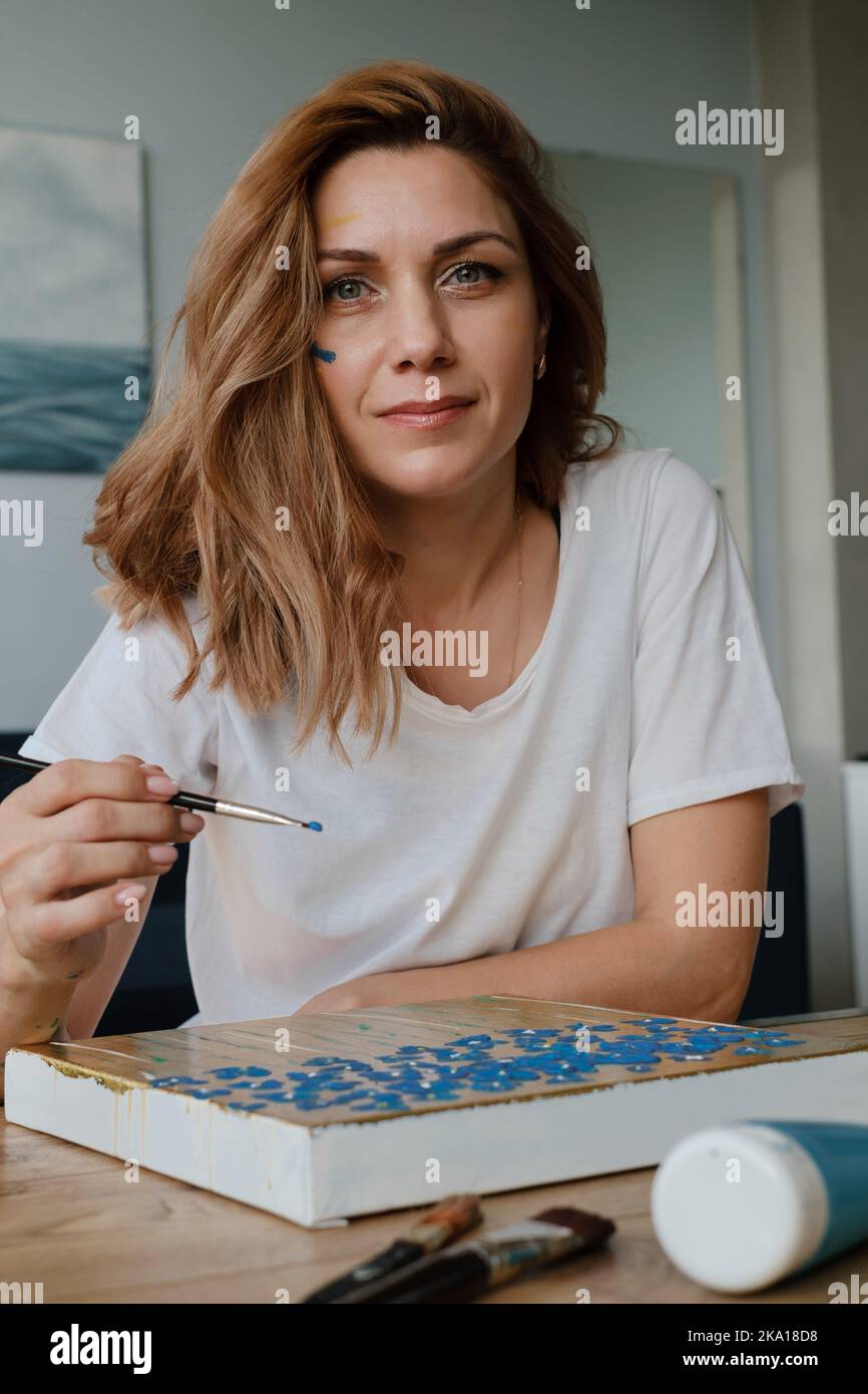 Closeup portrait of happy creative young woman smiling and looking ...